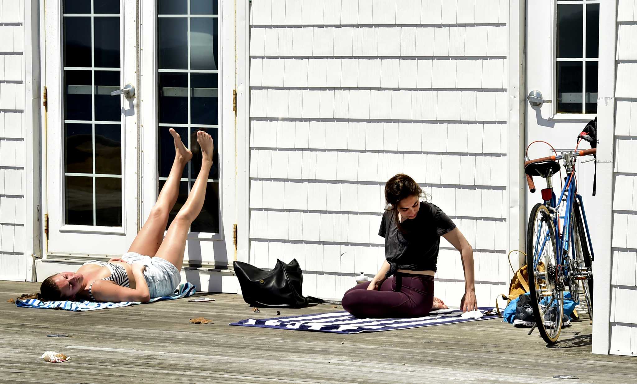 Photos: Warm weather brings people out to CT beaches