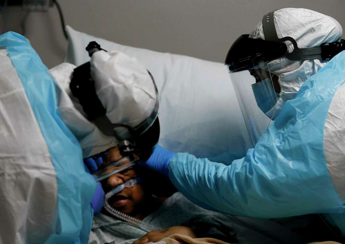 ‘We’re all they’ve got:' In a north Houston hospital, overworked staff ...