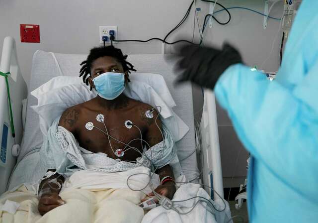 ‘We’re all they’ve got:' In a north Houston hospital, overworked staff ...