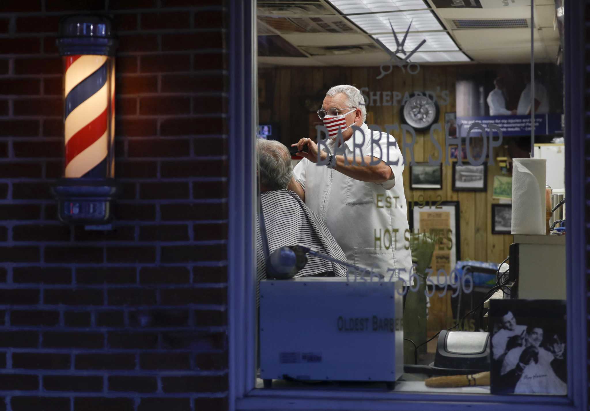 108-year-old Conroe barber shop reopens to eager clientele after ...