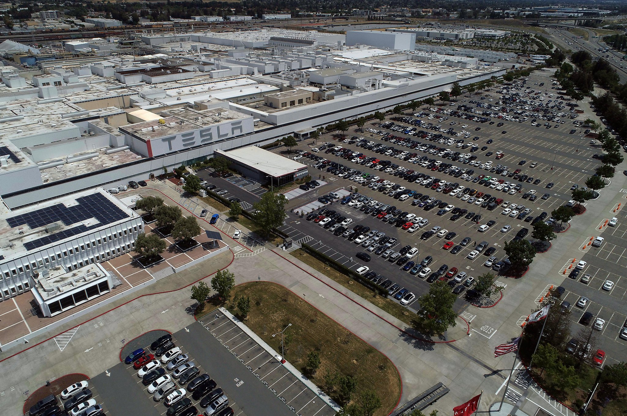 Elon Musk says Tesla restarting Fremont factory despite county orders ...