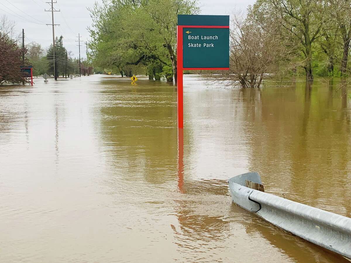 Aerial photographs show flooding in downtown Midland Tuesday