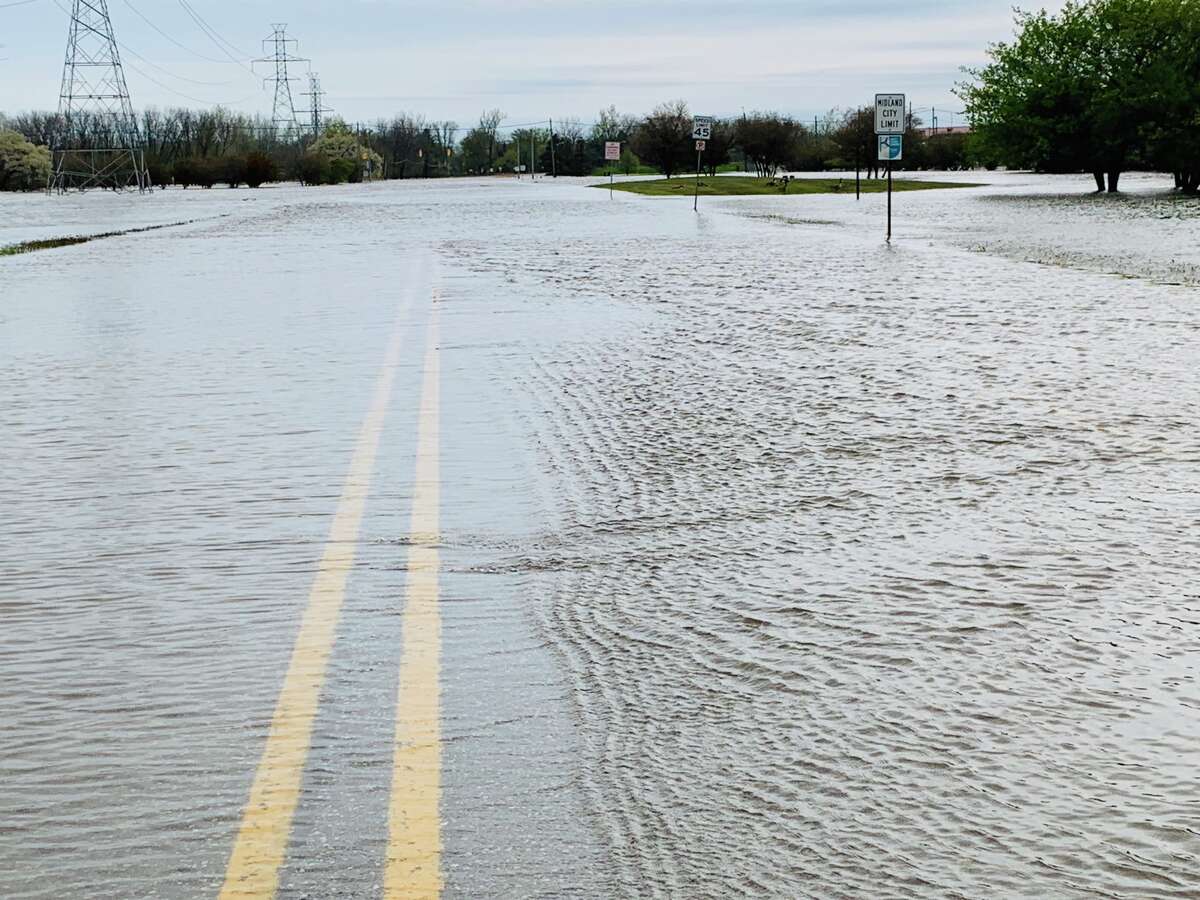Aerial photographs show flooding in downtown Midland Tuesday