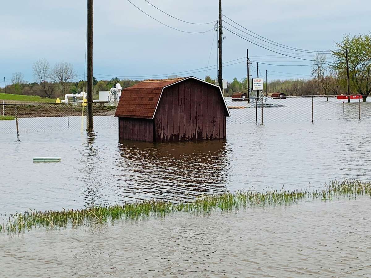 Aerial photographs show flooding in downtown Midland Tuesday