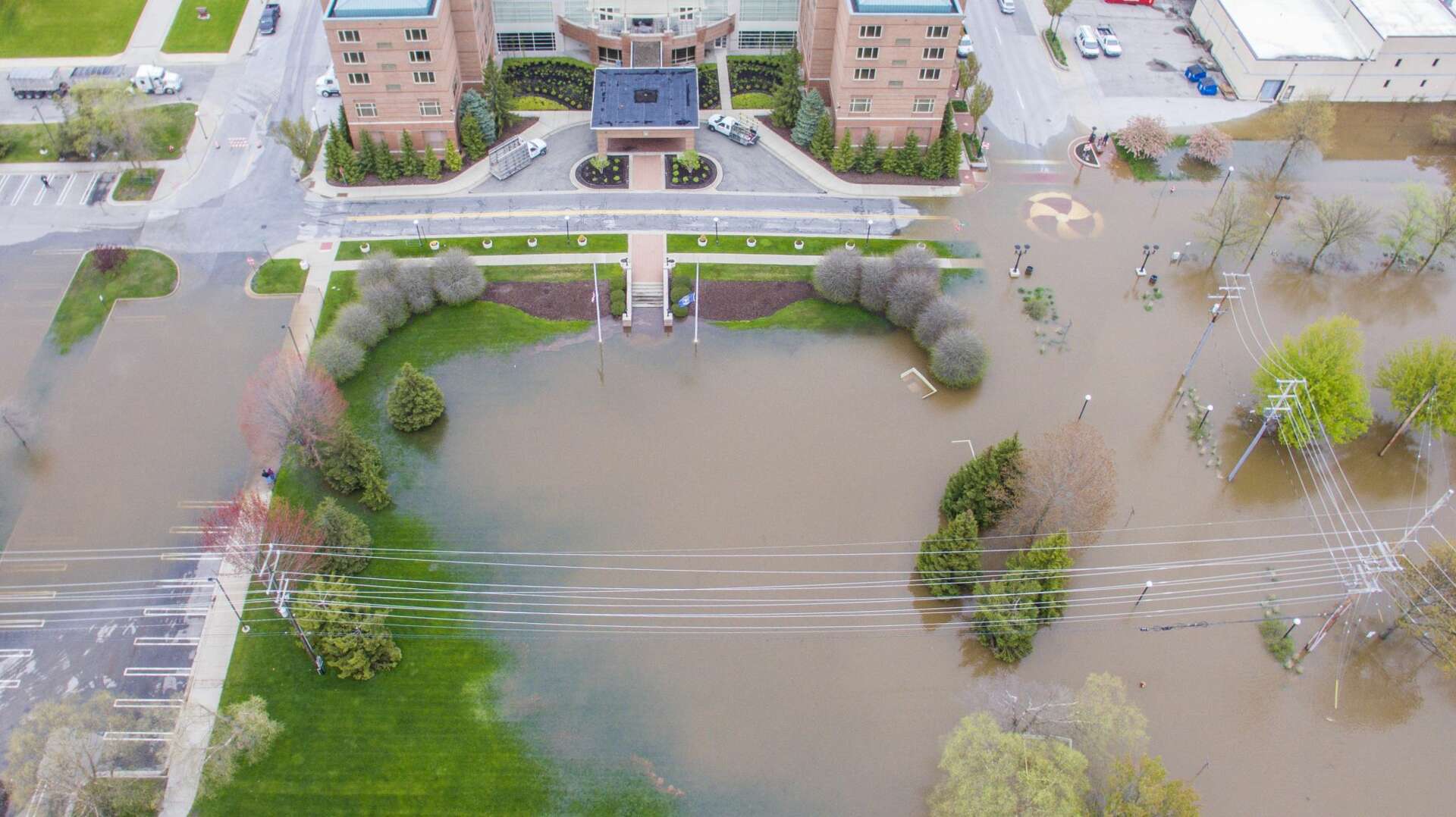 Aerial photographs show flooding in downtown Midland Tuesday