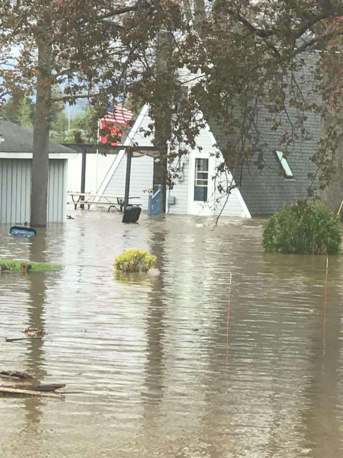 Aerial photographs show flooding in downtown Midland Tuesday