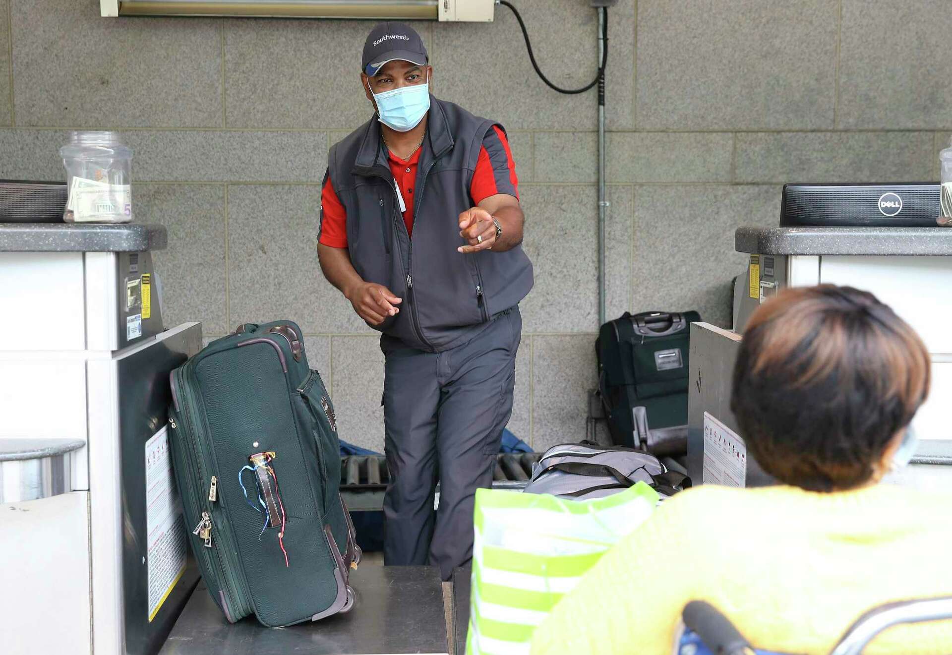 Southwest Airlines skycap lifts spirits of passengers at San Antonio ...