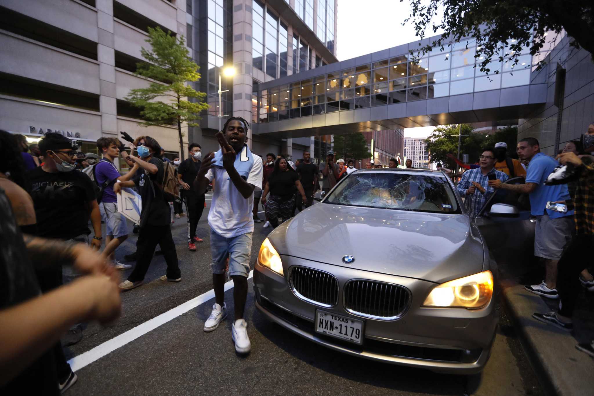 Houston rally over George Floyd’s death leads to damage, injuries