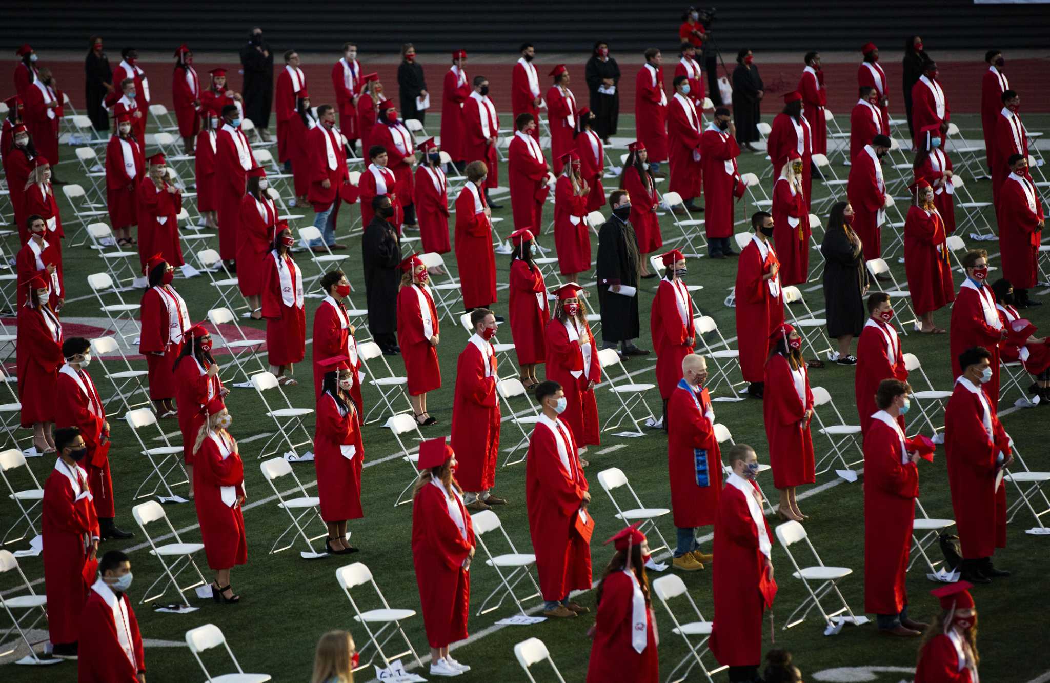High school seniors brave pandemic guidelines, downpours on first day ...