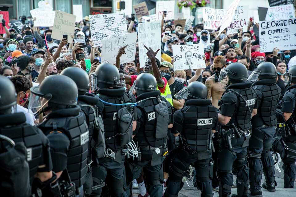 23 photos that capture the weekend's protest, chaos, cleanup in San Antonio