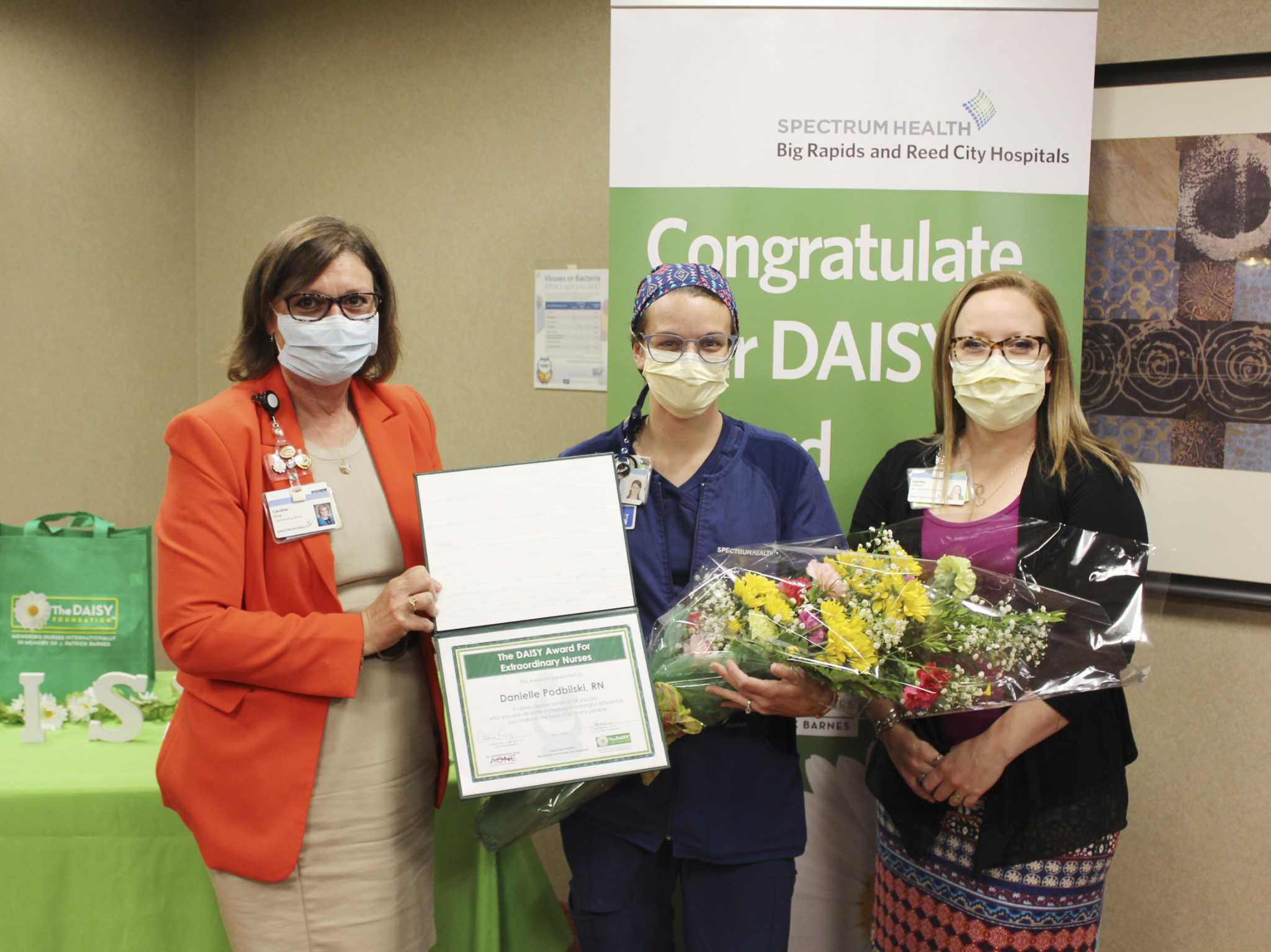 Spectrum Health nurse, patient services employee honored