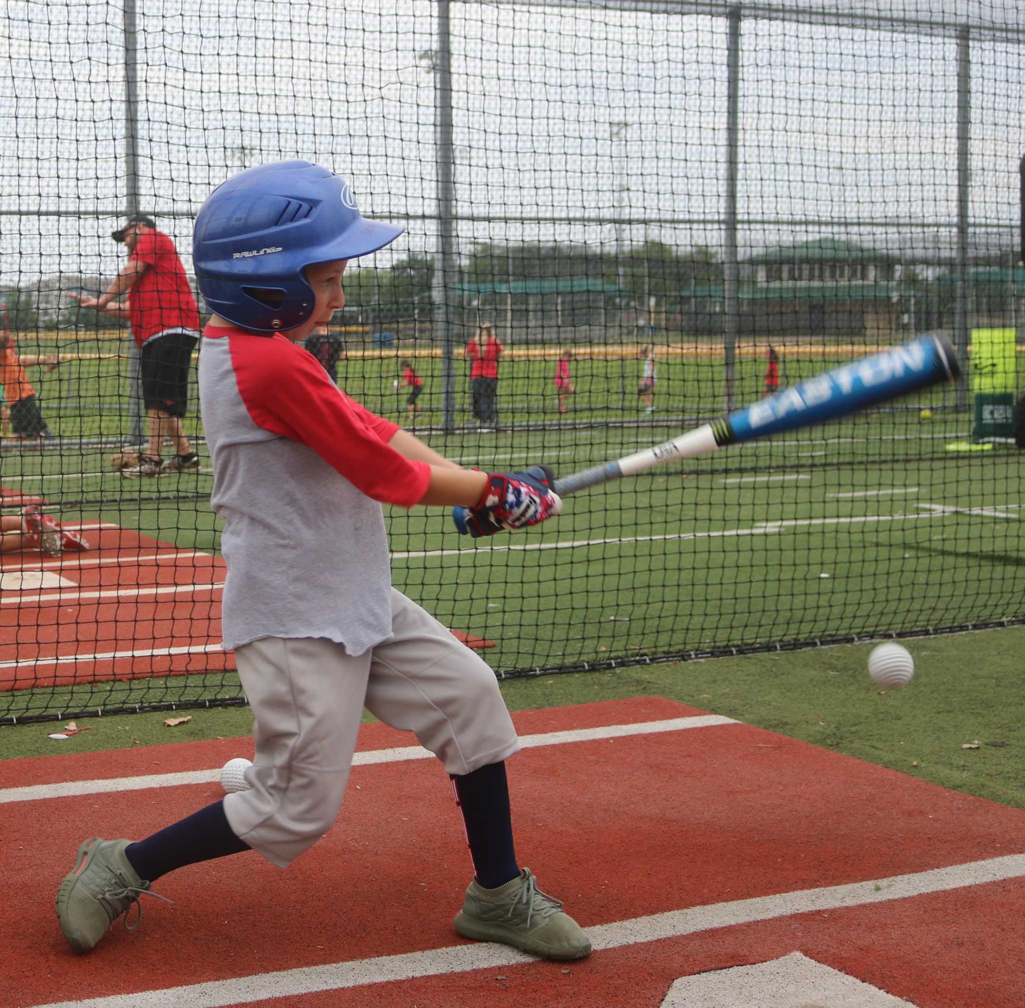Excitement in the air as League City youth baseball, softball teams ...