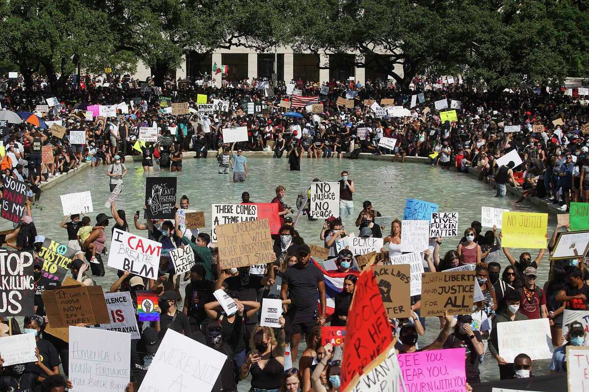 Tens of thousands march on downtown Houston to memorialize George Floyd