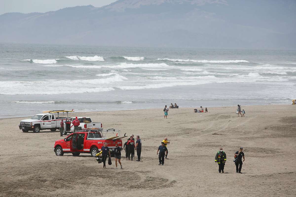 Five swimmers caught in riptide at Ocean Beach, all rescued with help ...