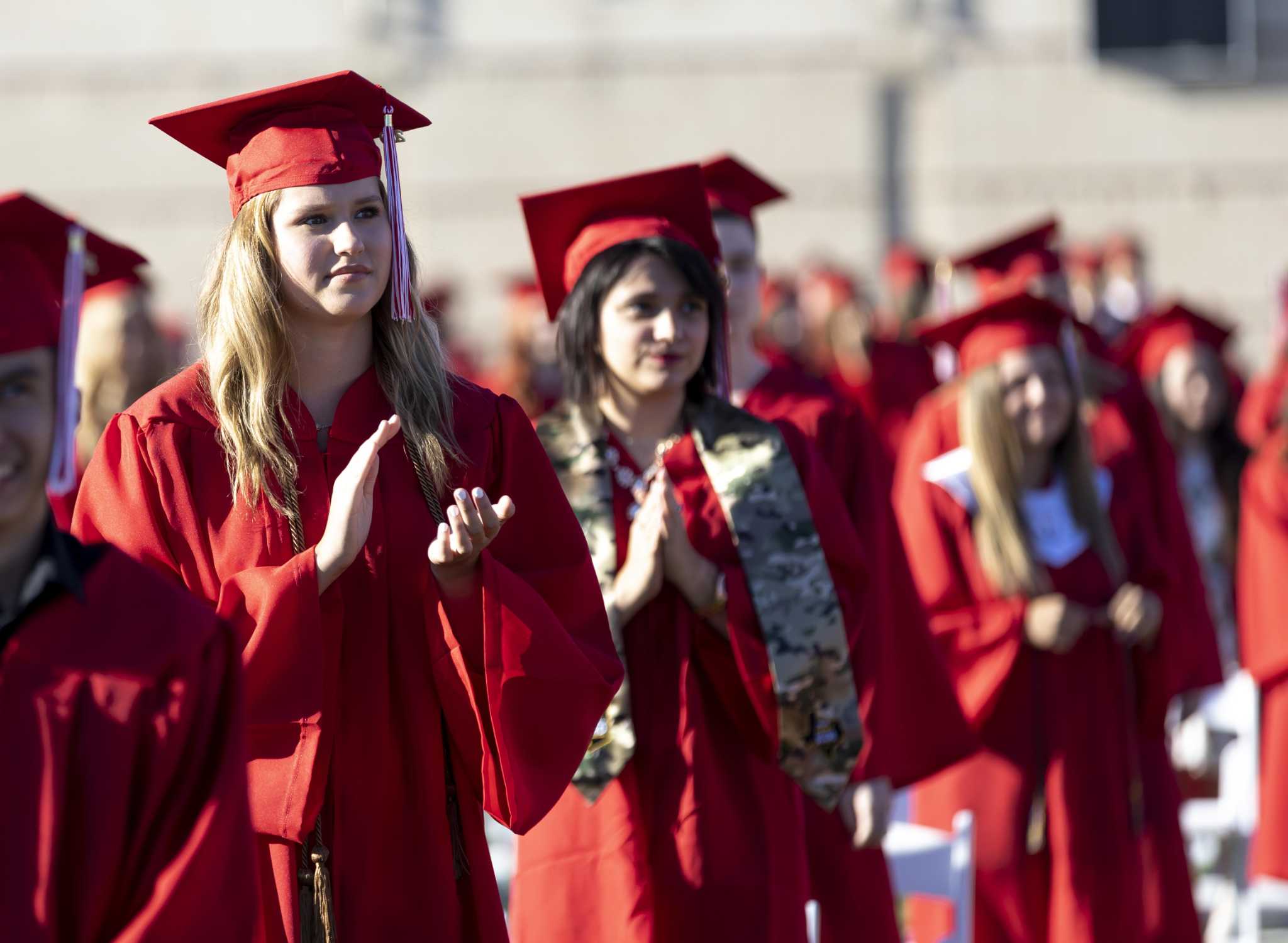Tomball ISD seniors experience outdoor graduation at Woodforest Bank ...