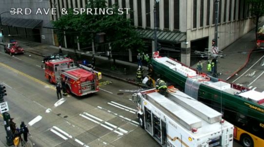 Metro bus crashes into pole in downtown Seattle; driver extricated