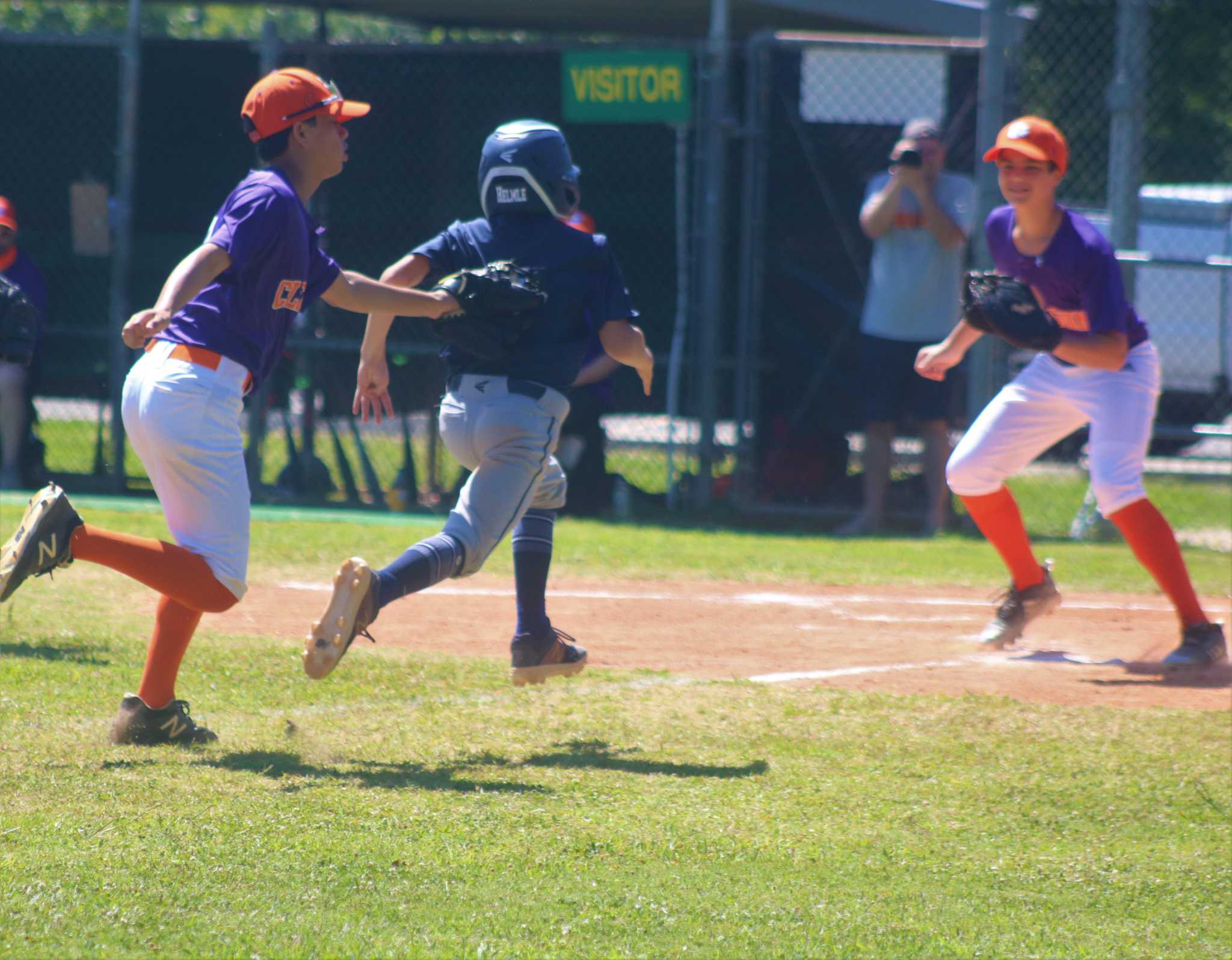 Busy baseball day at Bay Area Park gets youth sports going again