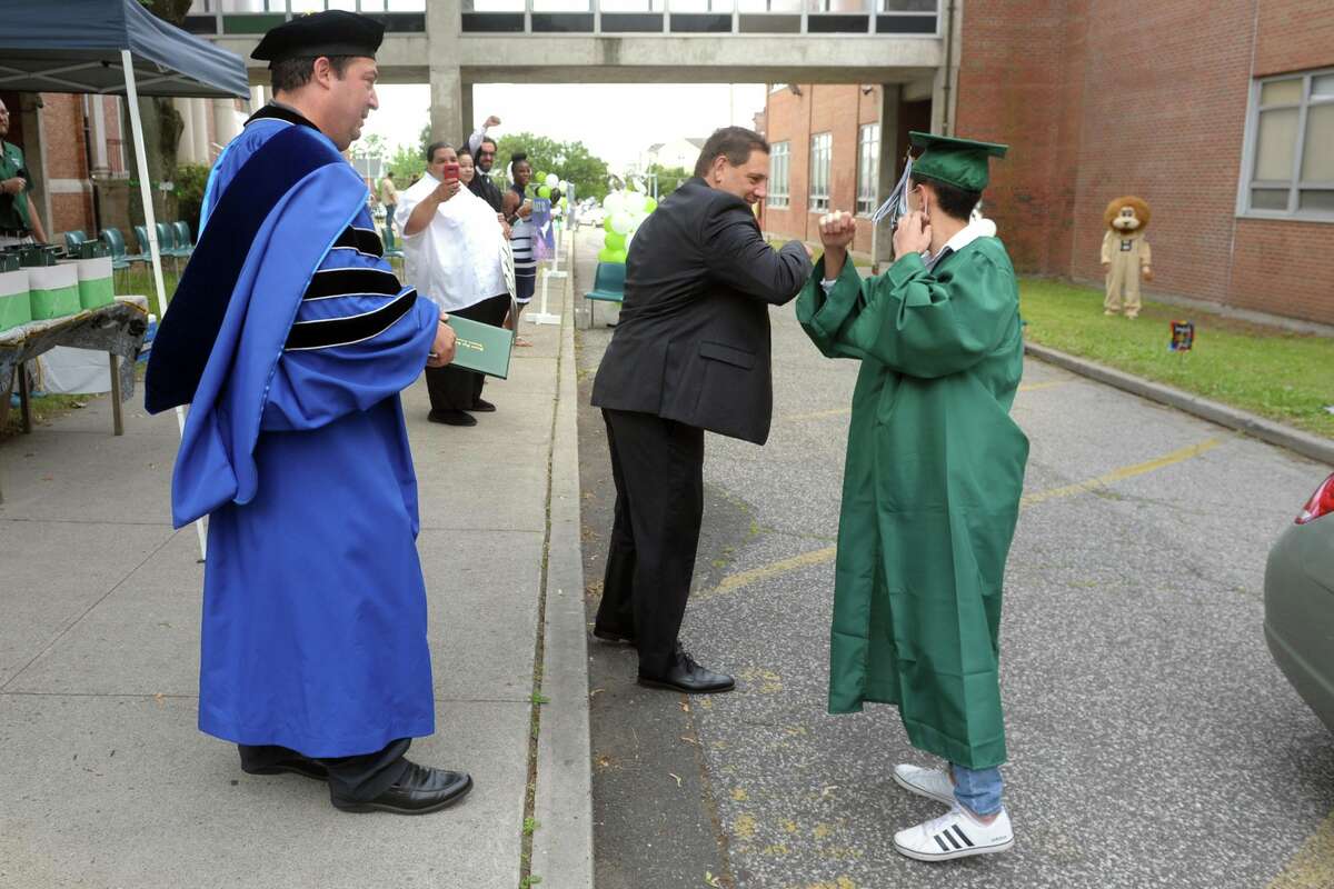 Bassick seniors get a hero’s send-off at drive-up graduation in Bridgeport