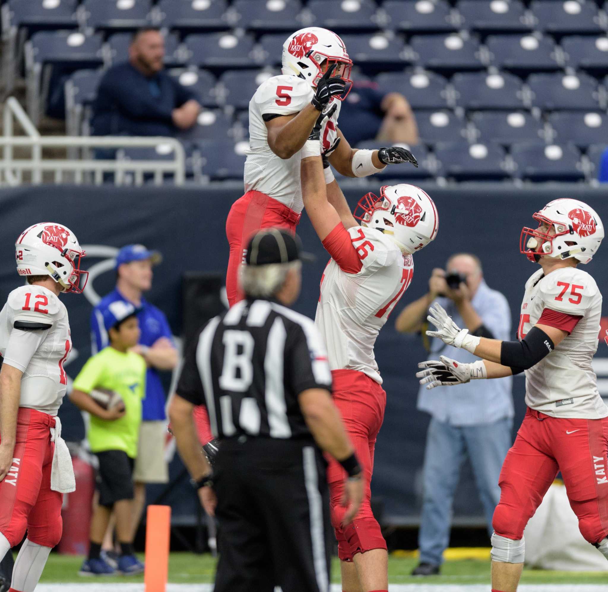 Katy alumni Galvin, Stewart named to Texas Football college preseason team