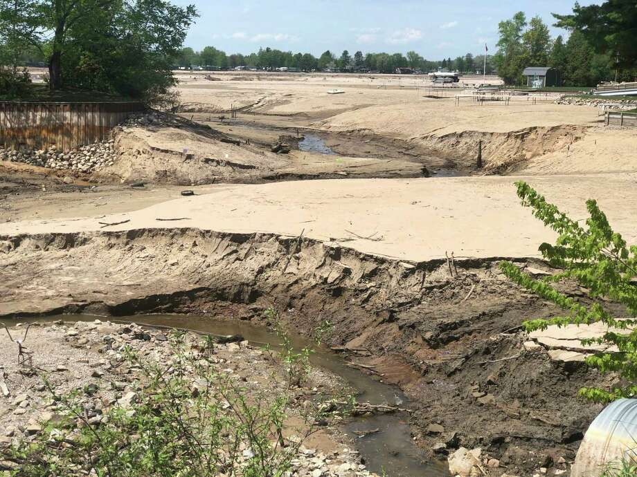 Sanford, Wixom Lake residents fear homes will be lost to erosion ...