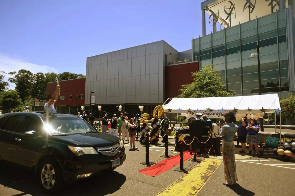 Photos: Magnet students get diplomas at Fairchild Wheeler drive-up graduation