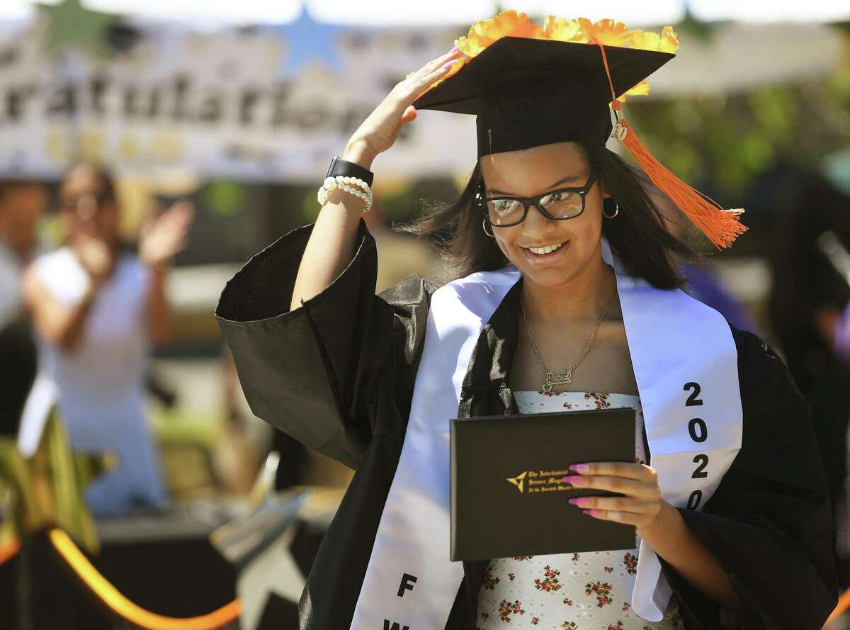 Photos: Magnet students get diplomas at Fairchild Wheeler drive-up graduation