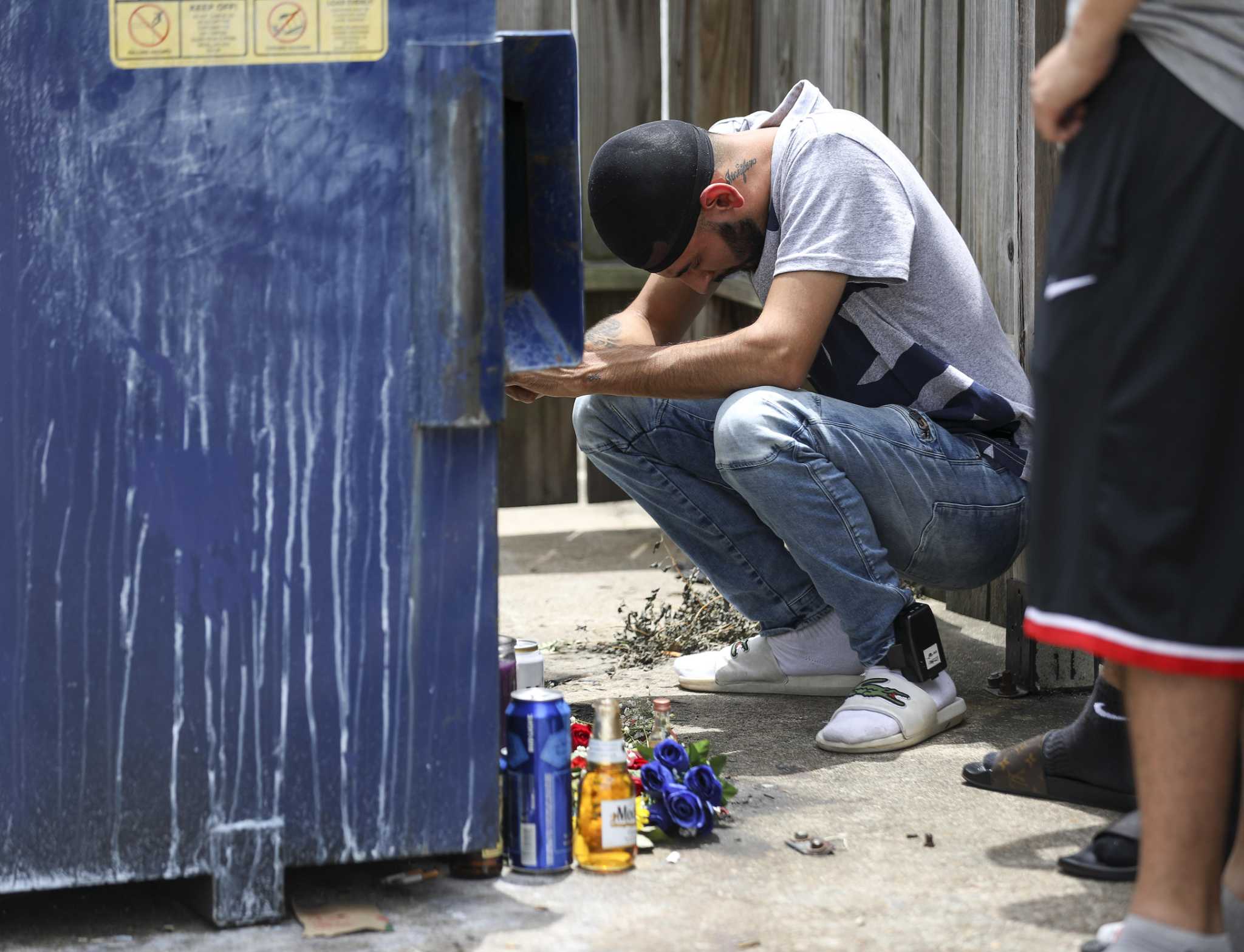 Near Northside man mourned after body found shot, burned next to dumpster