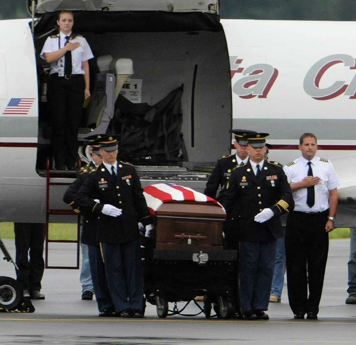Village turns out to honor fallen GI
