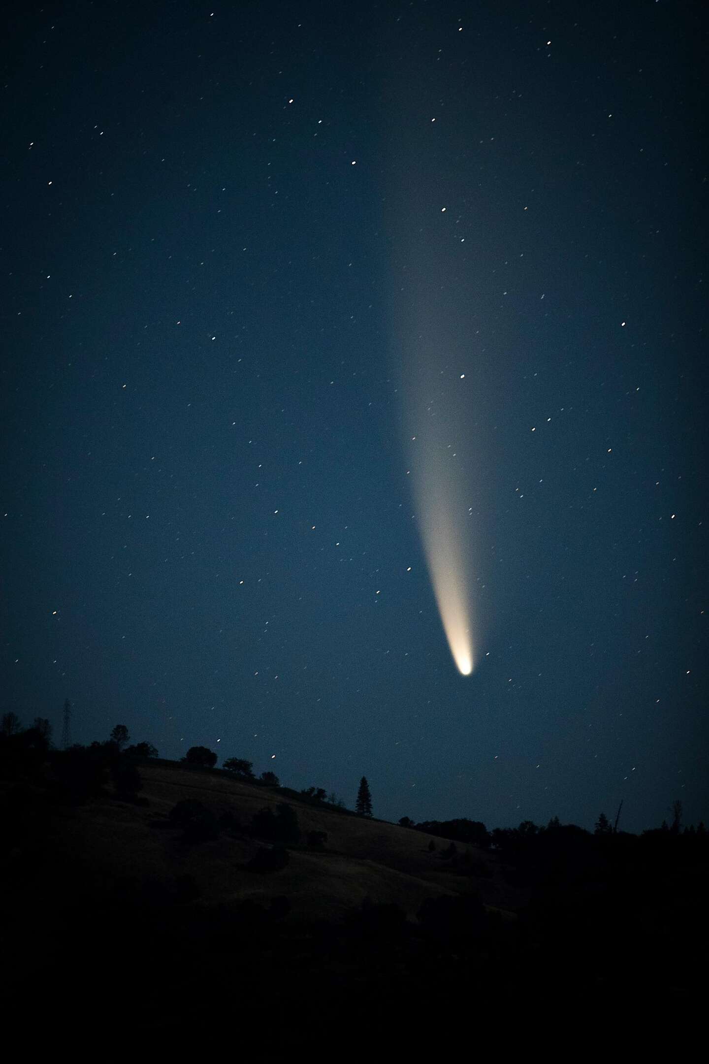 New comet Neowise dazzling onlookers in rare pass by Earth