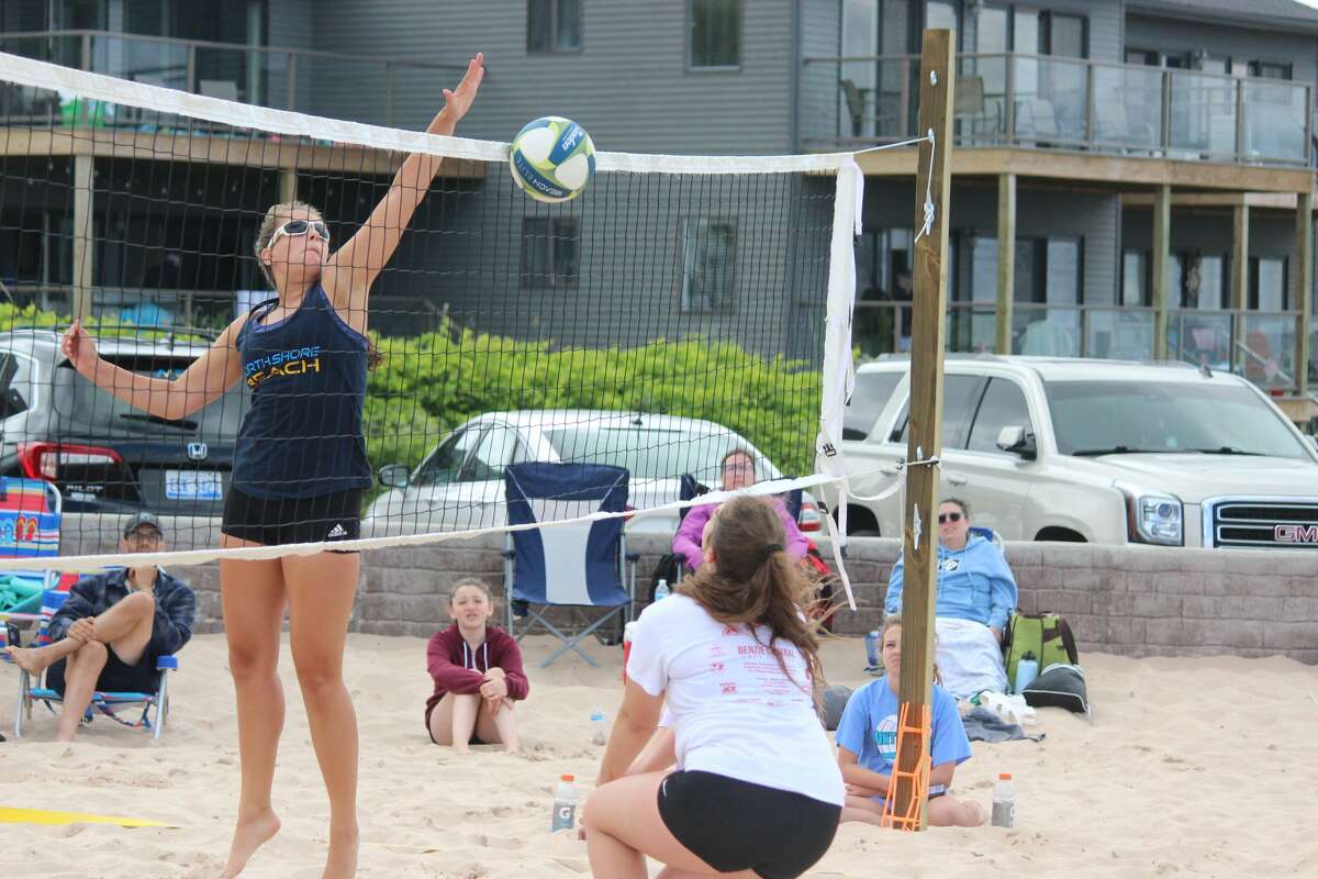Photos: Volleyballers hit the beach