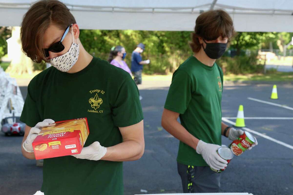 Photos: Boy Scouts lead ‘critical’ food drive for Operation Hope