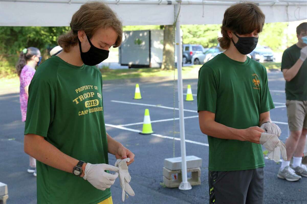 Photos: Boy Scouts lead ‘critical’ food drive for Operation Hope