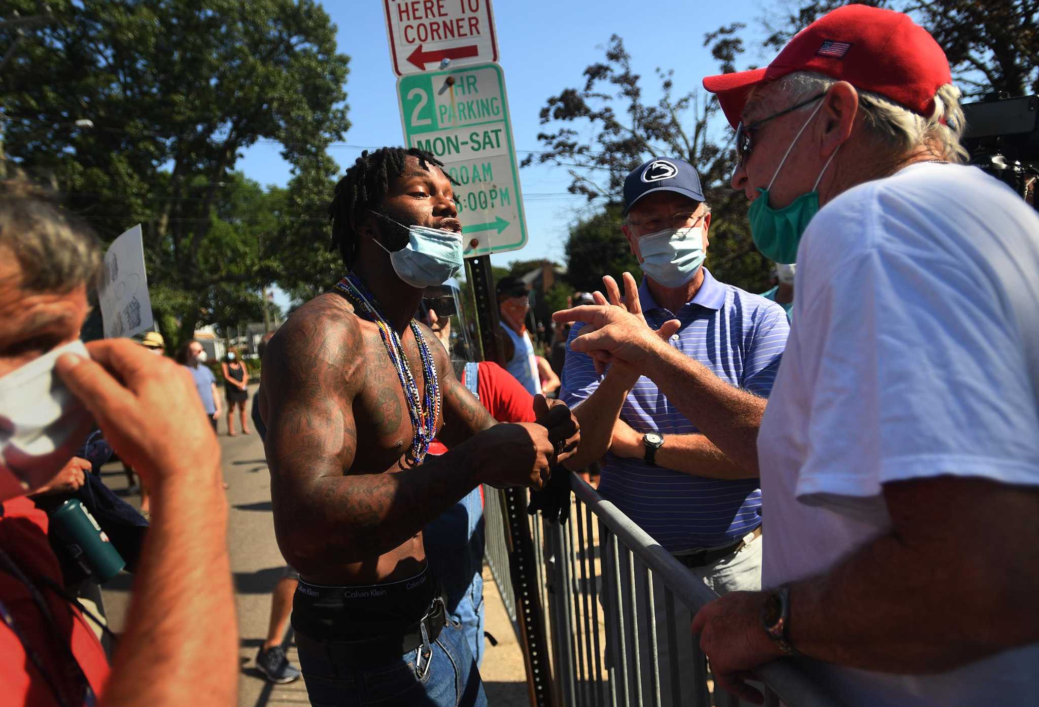 Police rally against accountability bill cut short after BLM protesters ...