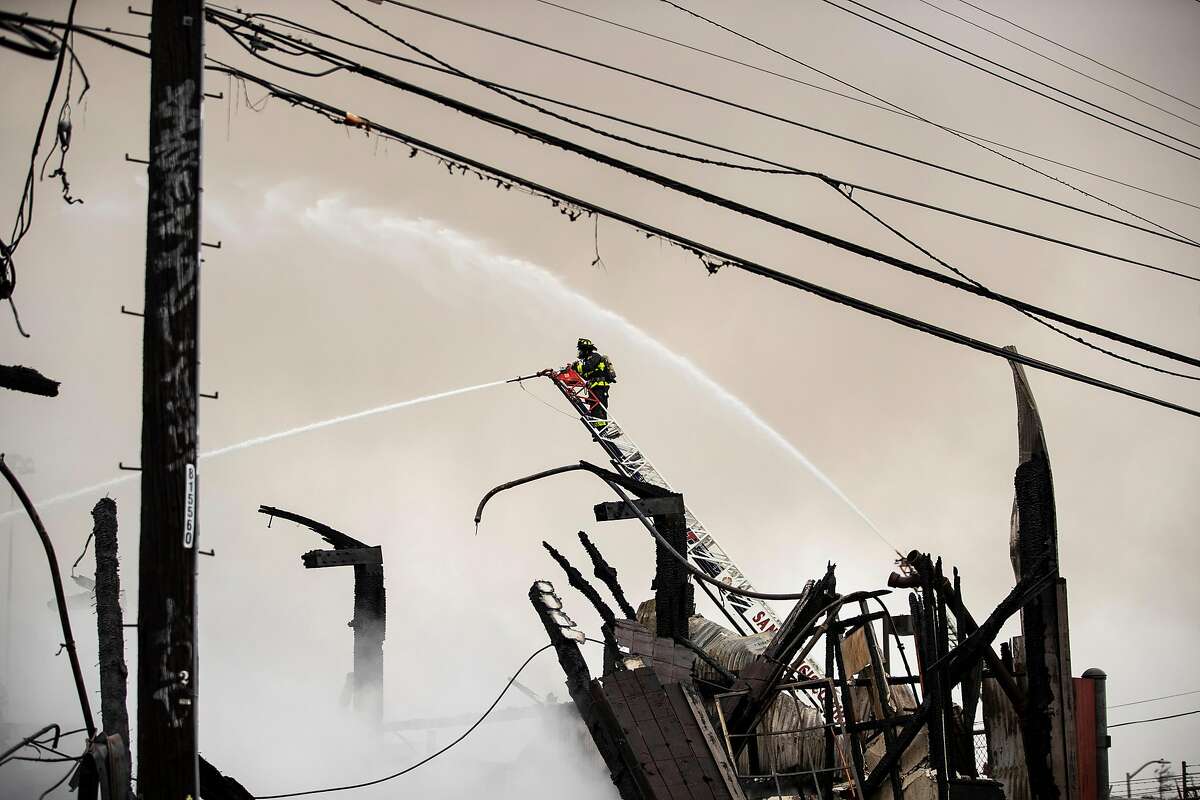 Huge fire near Central Freeway in SF spreads to multiple buildings ...