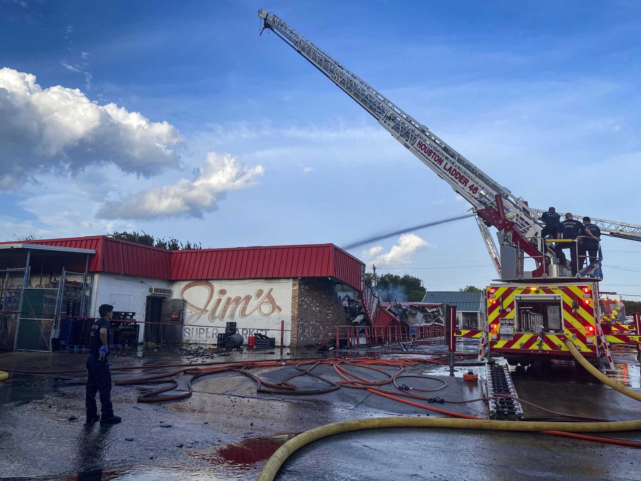 Firefighters working to extinguish Third Ward grocery store fire