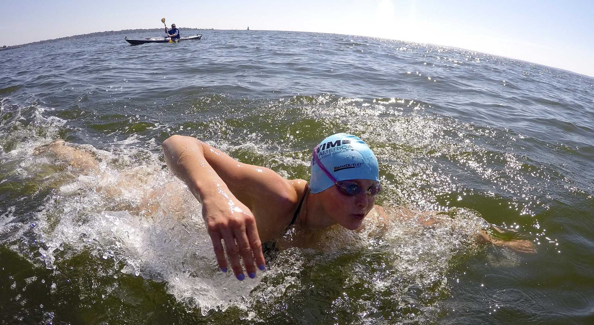 Greenwich swimmers take the plunge to fight cancer