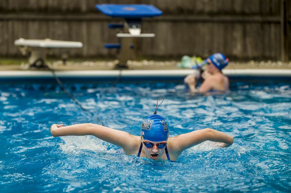 Local swim coach offers backyard pool for training, indoor pools closed ...