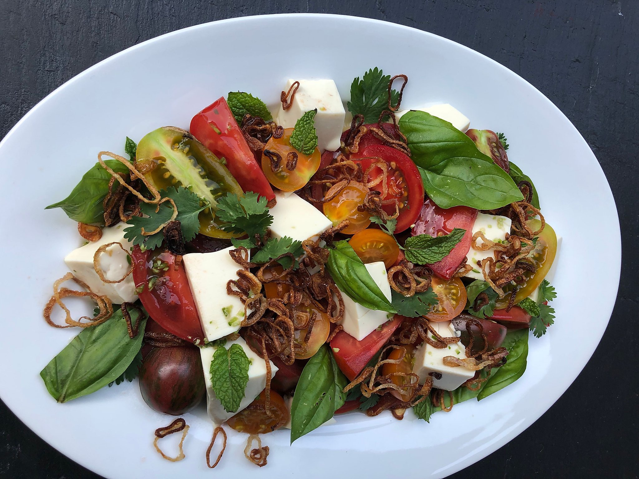 Tomatoes & silken tofu mix it up in a cool summer salad
