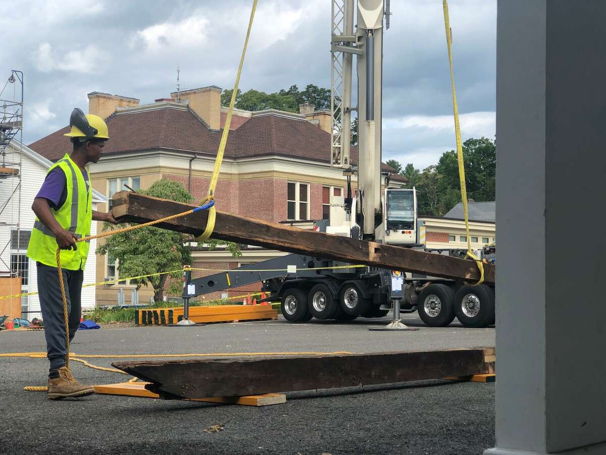New beam marks major milestone in church construction project