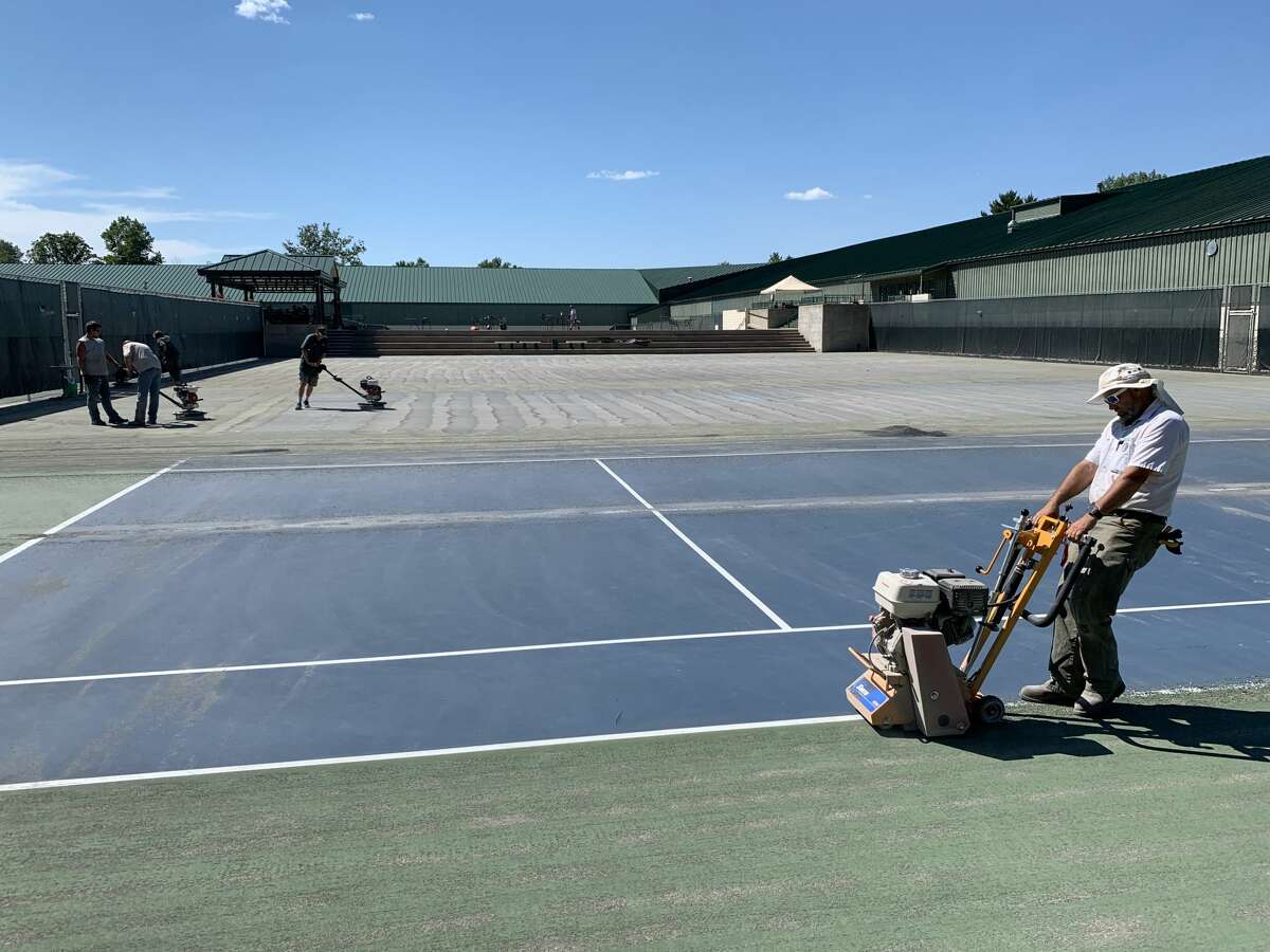 Work crews resurface Greater Midland Tennis Center's outdoor courts