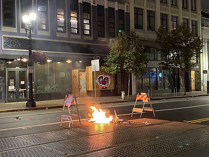 Demonstrators hit streets of Oakland, courthouse fire set