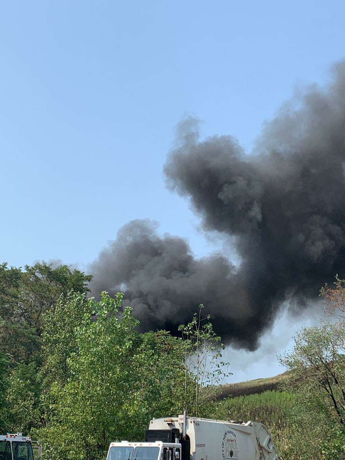 Officials: Piles of vehicles on fire at New Haven junkyard