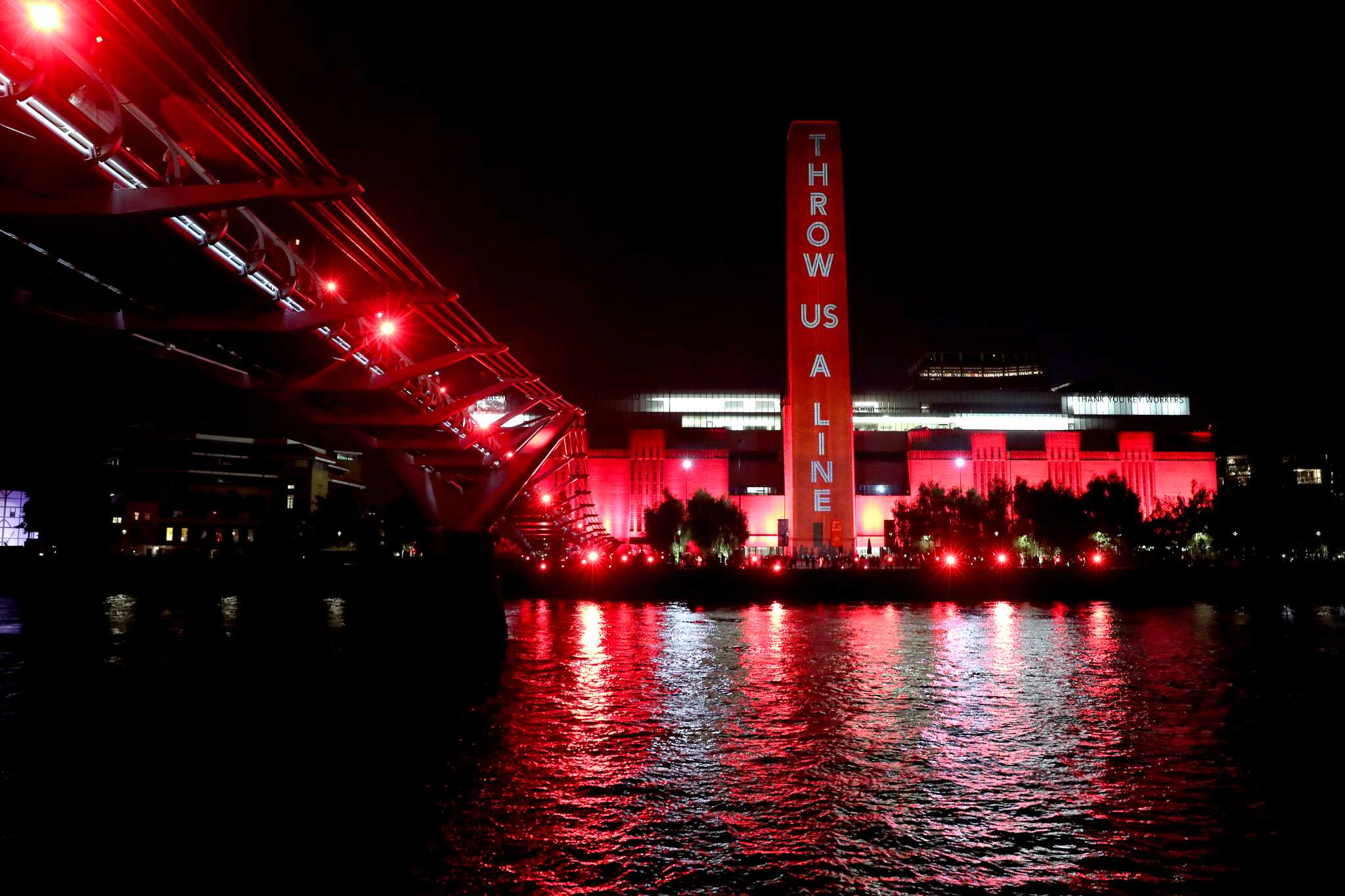 Venues lit in red to call attention to plight