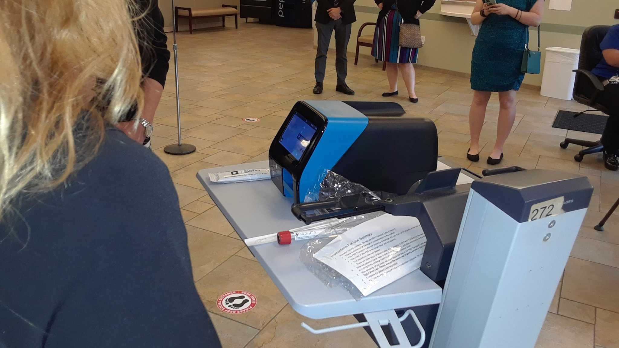 Blumenthal visits health center to see new rapid result testing machine ...