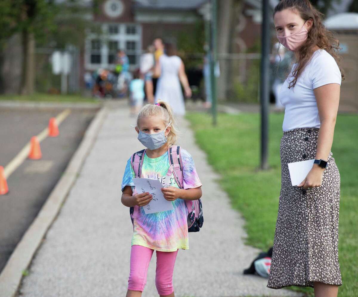 PHOTOS: ‘School comes alive again’: Staff welcomes students on first day