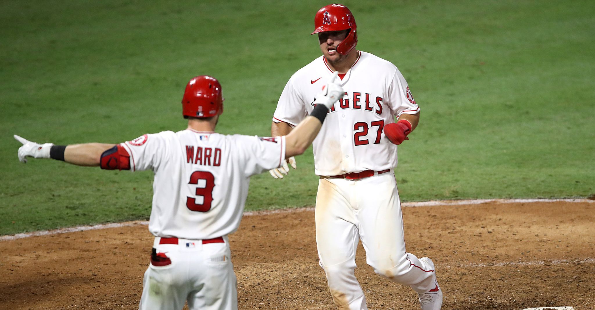 Mike Trout ties Angels' HR record, then scores winning run against Astros