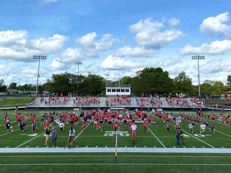 ‘Let us play!’: New Canaan football community comes out to support high ...