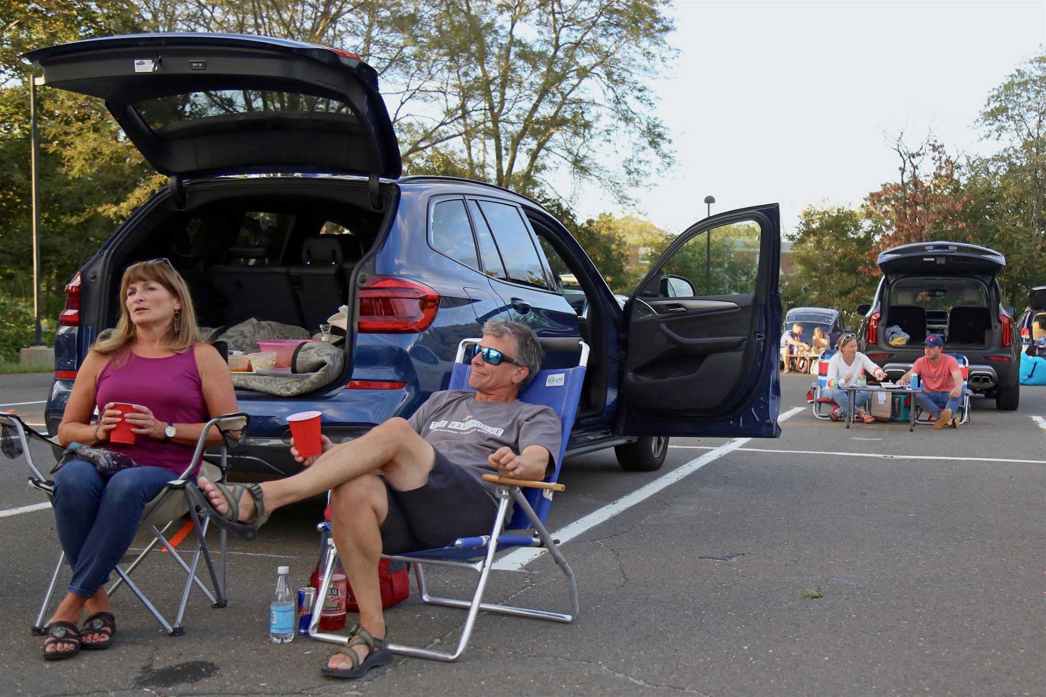 Outdoor concert attracts sold-out crowd to Westport parking lot