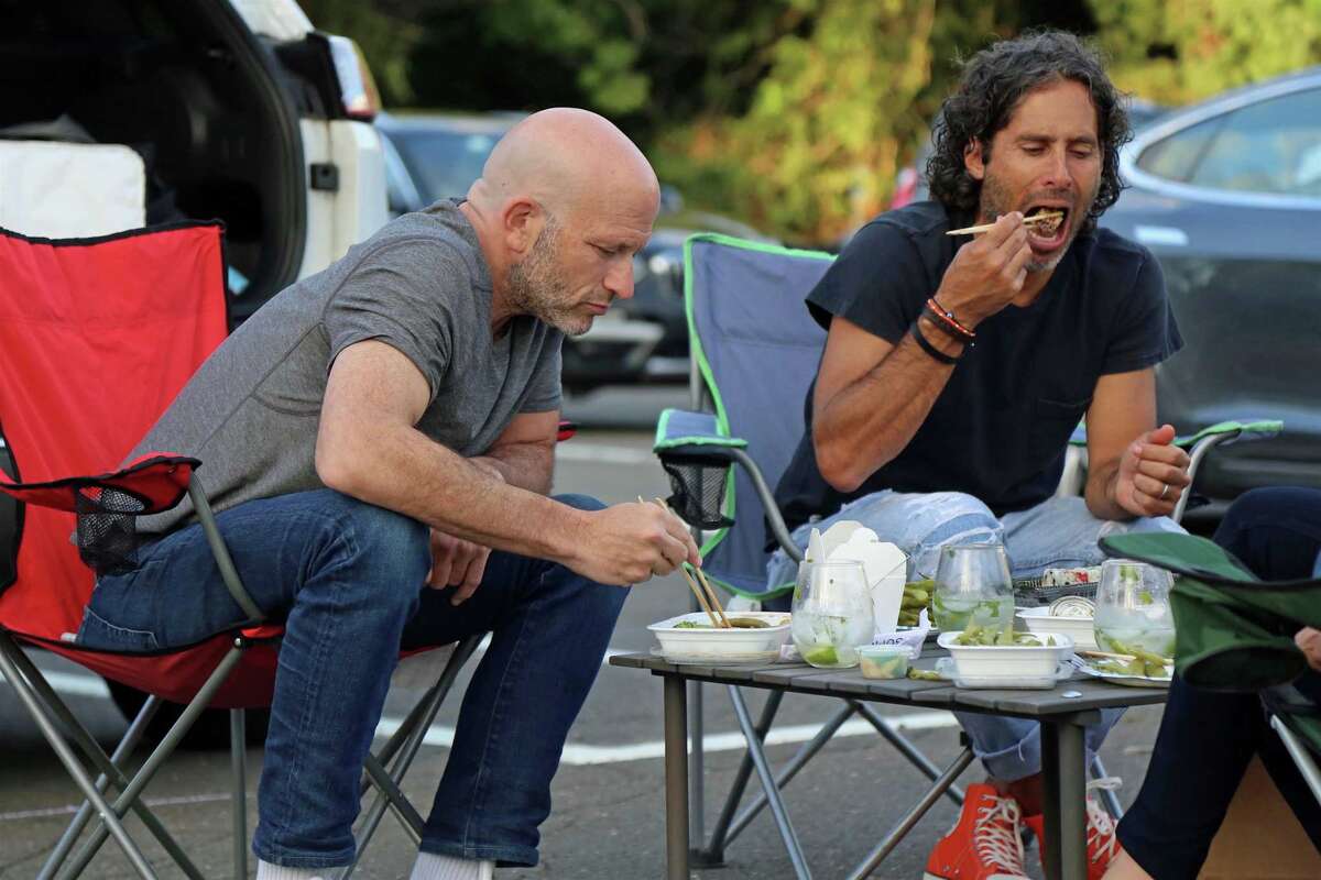 Outdoor concert attracts sold-out crowd to Westport parking lot