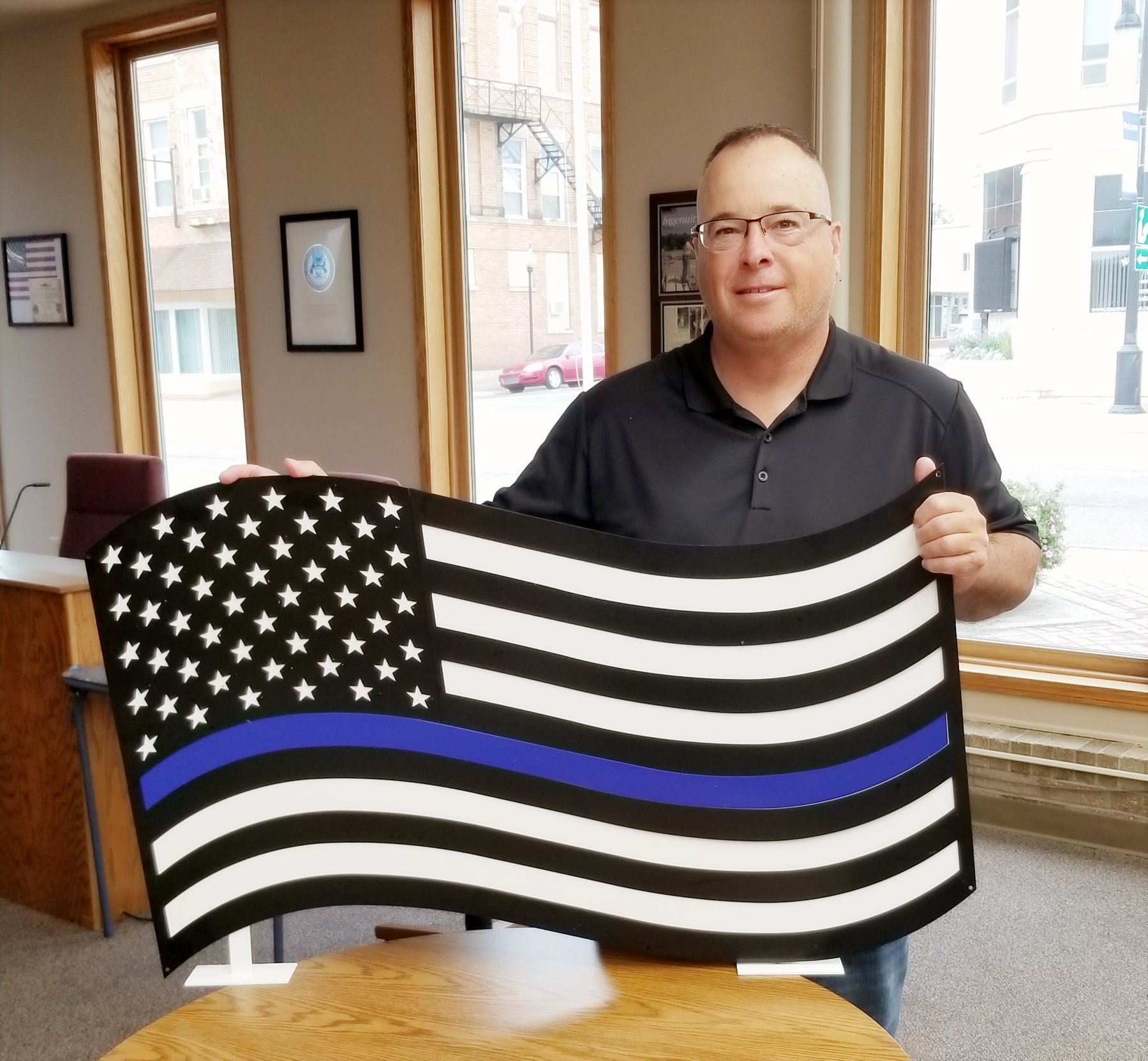 Thin Blue Line flag donated to the Bad Axe Police Department